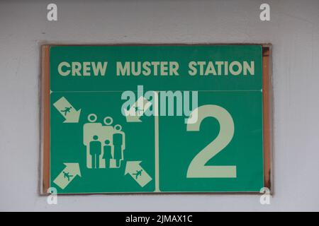 Lifeboat Assembly Station sign on board a cruise ship Stock Photo - Alamy