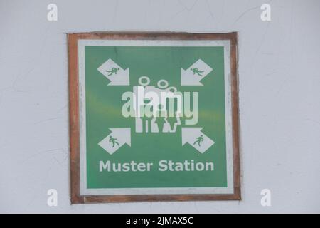 Crew muster station sign on a cruise ship open deck Stock Photo - Alamy