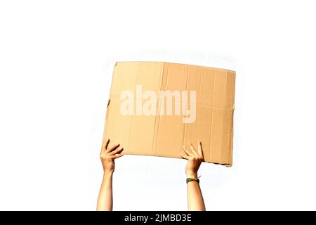 A cardboard Signs empty held by hands on a white background ready for ...