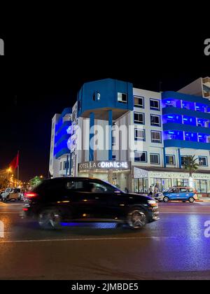 The exterior of hotel La Corniche in Fnideq at night Stock Photo - Alamy