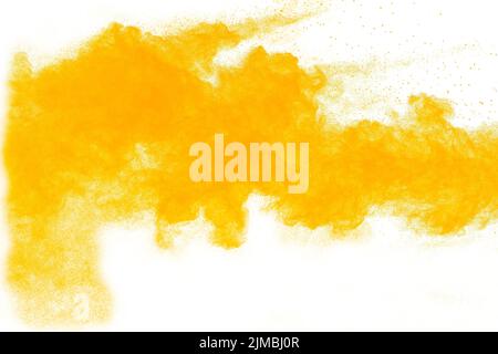 Freeze motion of yellow dust explosion isolated on black background ...