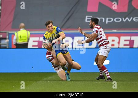 Matty Ashton #5 of Warrington Wolves makes a 60 yard dash for a solo ...