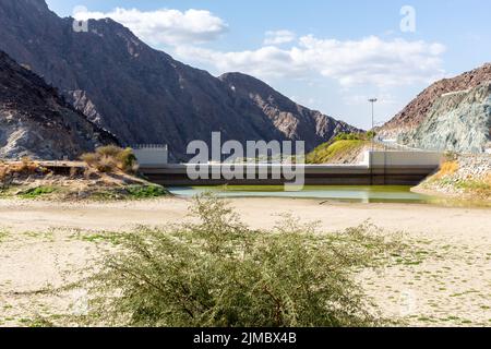 Wadi Shawka Dam, almost empty dam in Hajar Mountains, Ras al Khaimah ...