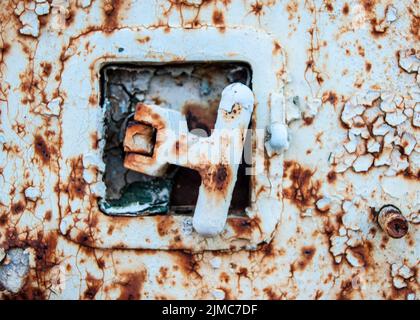 Old age, vintage, metal corrosion, layers of old peeling paint on an ...