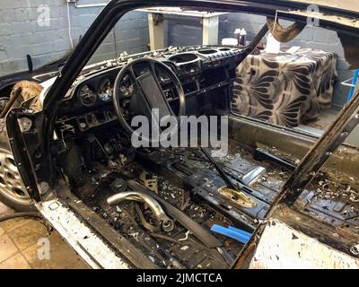 Gutted rusty body of historic classic sports car Classic Car Porsche ...