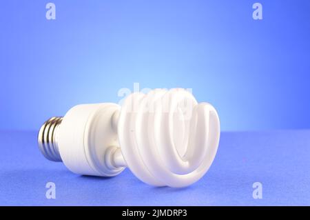 Standard lightbulb and compact fluorescent lightbulb Stock Photo - Alamy