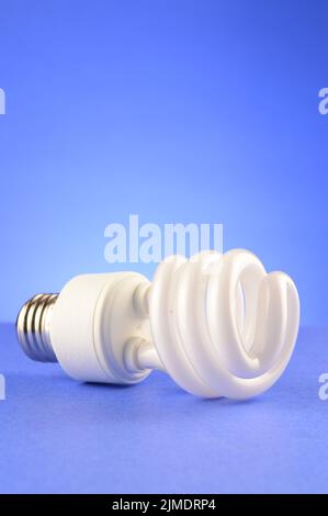 Standard lightbulb and compact fluorescent lightbulb Stock Photo - Alamy