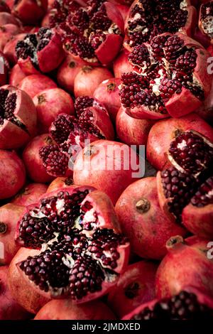 Cracked pomegranate. Ripe Pomegranates Background Stock Photo - Alamy