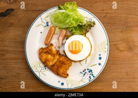 Fried sausages with vegetables, top view Stock Photo - Alamy