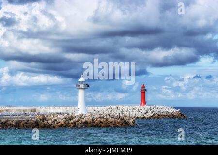 Sacheon beach light houses Stock Photo - Alamy