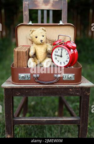 red alarm clock with 3 wooden toy blocks, template for countdown or ...