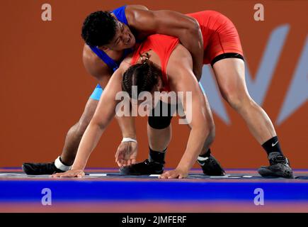 Canada’s Justina di Stasio competes against India’s Pooja Sihag in the ...