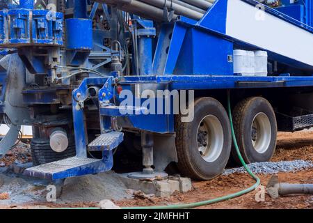 Portable hydraulic water well drilling rig with water extraction on a ...