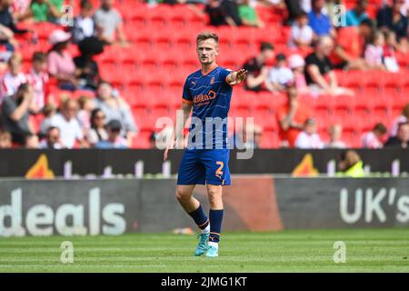Callum Connolly #2 of Blackpool gives his team instructions Stock Photo ...