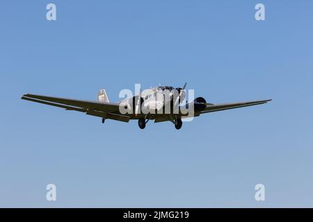 An old three-engine airliner in flight, the Ju 52 Stock Photo - Alamy