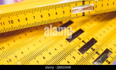 carpenter essential instrument level rulers Stock Photo - Alamy