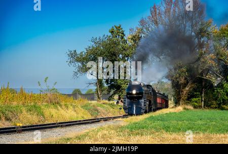 Antique Restored Steam Engine Approaching on Some Old Rail Road Tracks ...