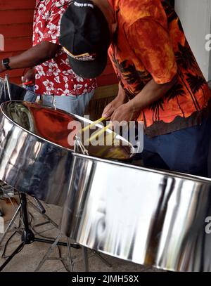 Musicians playing traditional Caribbean style steel drums Stock Photo ...