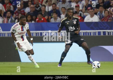 Oumar GONZALEZ of Ajaccio and Karl TOKO EKAMBI of Lyon during the ...