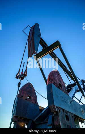 The artificial lift of petroleum with a beam pumping unit Stock Photo ...