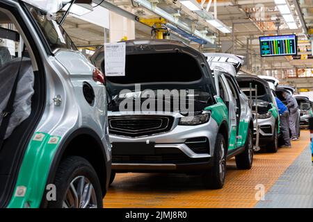 Photo of automobile production line. Modern car assembly plant. Modern ...
