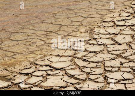 Dry lake bed. Drought ground with cracks Stock Photo - Alamy