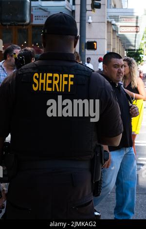 Seattle, USA. 28 Jul, 2022. A hired armed Sheriff outside walgreens in ...