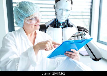 Scientist and humanoid robot work together Stock Photo - Alamy