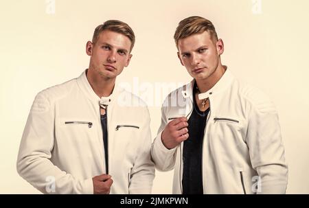 twinning. similar appearance. family relations and friendship. men ...