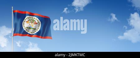 Belize flag isolated on a blue sky. Horizontal banner Stock Photo - Alamy