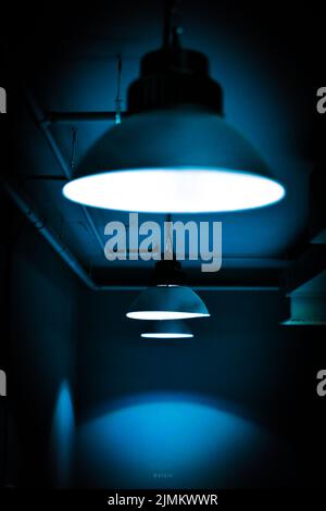 Lightened lamp inside a building Stock Photo - Alamy