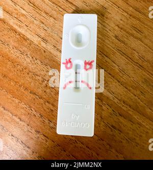 Express corona test. Positive covid antigen test Stock Photo - Alamy