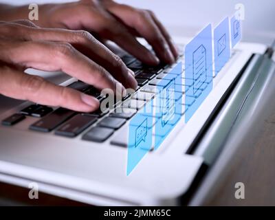 Hands man useing laptop computer with E-commerce technology icons on ...