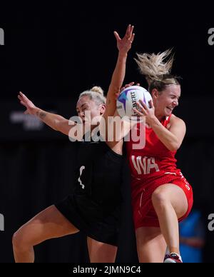 England's Natalie Metcalf (right) and New Zealand's Kate Heffernan ...