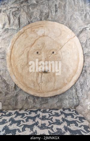 Mouth of truth sightseeing in Rome, Italy. Historical sculpture made of ...