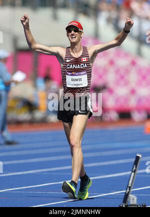 Evan DUNFEE of Canada wins the Men's 35 Kilometres Race Walk at the ...