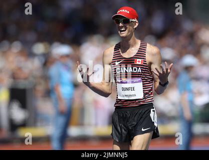 Evan DUNFEE of Canada wins the Men's 35 Kilometres Race Walk at the ...
