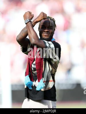 West Ham United's Maxwell Cornet is unveiled on the pitch after ...