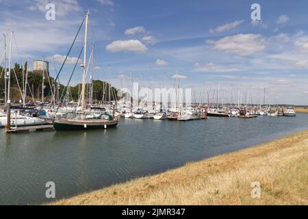 Shotley marina on a summers day in Suffolk with a boat entering the ...