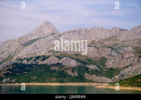 View of the Riaño reservoir and surrounding mountains range, Riaño ...