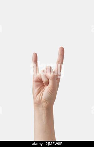 Rock gesture hand sign with index finger and pinky raised, symbol of ...