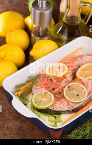 Fresh rosemary and lemons on dark background Stock Photo - Alamy