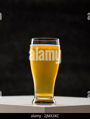 Glass with beer desk Stock Photo - Alamy