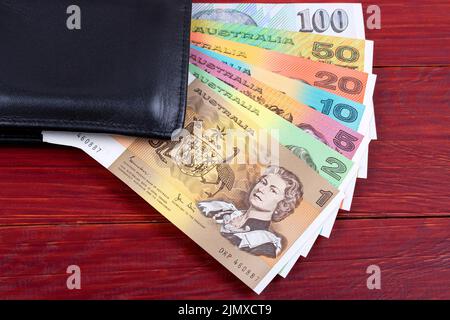 Australian money in the black wallet Stock Photo - Alamy