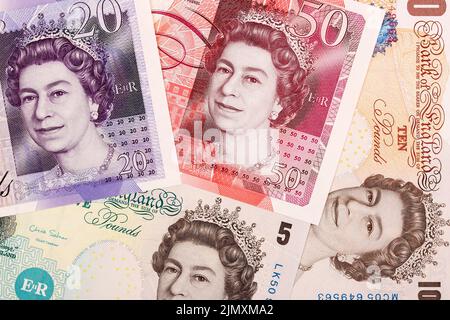 British Pounds in the black wallet Stock Photo - Alamy