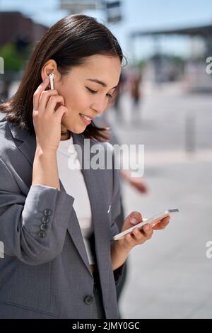 Asian woman using smartphone for video call consultation smiling happy ...