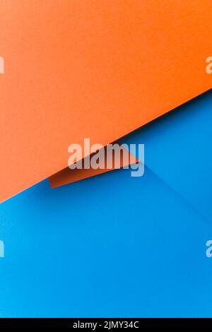 top view of green and colorful ribbon on green background with copy ...