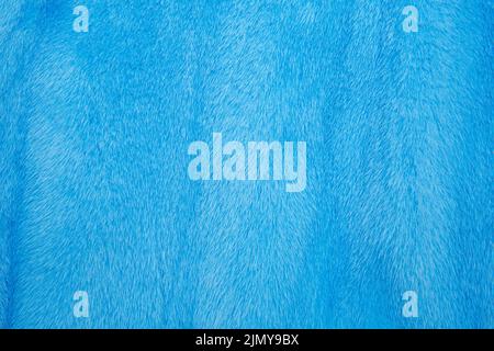 Light blue faux fur background. Close up surface wool texture. Minimal ...
