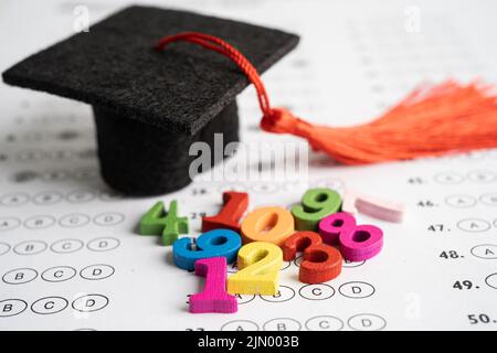 Math Number colorful with graduation hat and pencil on Answer sheet ...