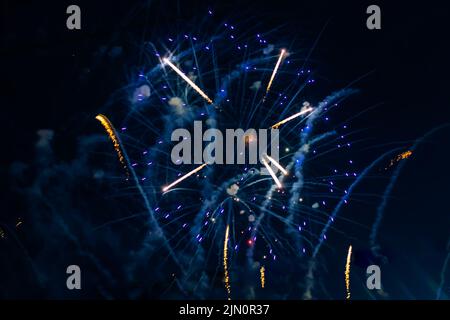 Bright, beautiful blue fireworks in the night sky. High quality photo ...